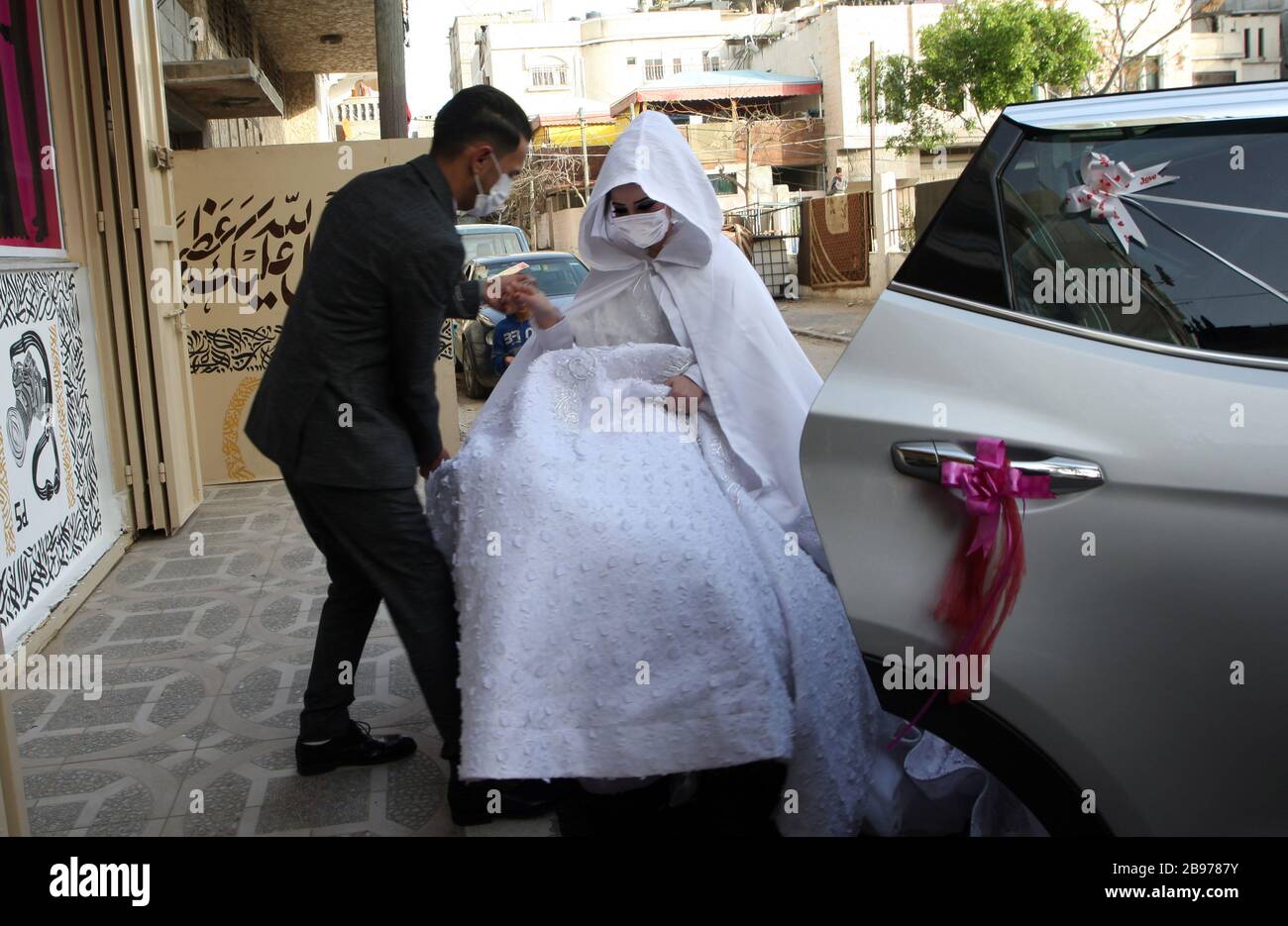 Khan Younis, Gaza. 23rd Mar 2020. Palestinian groom Mohamed abu Daga ...