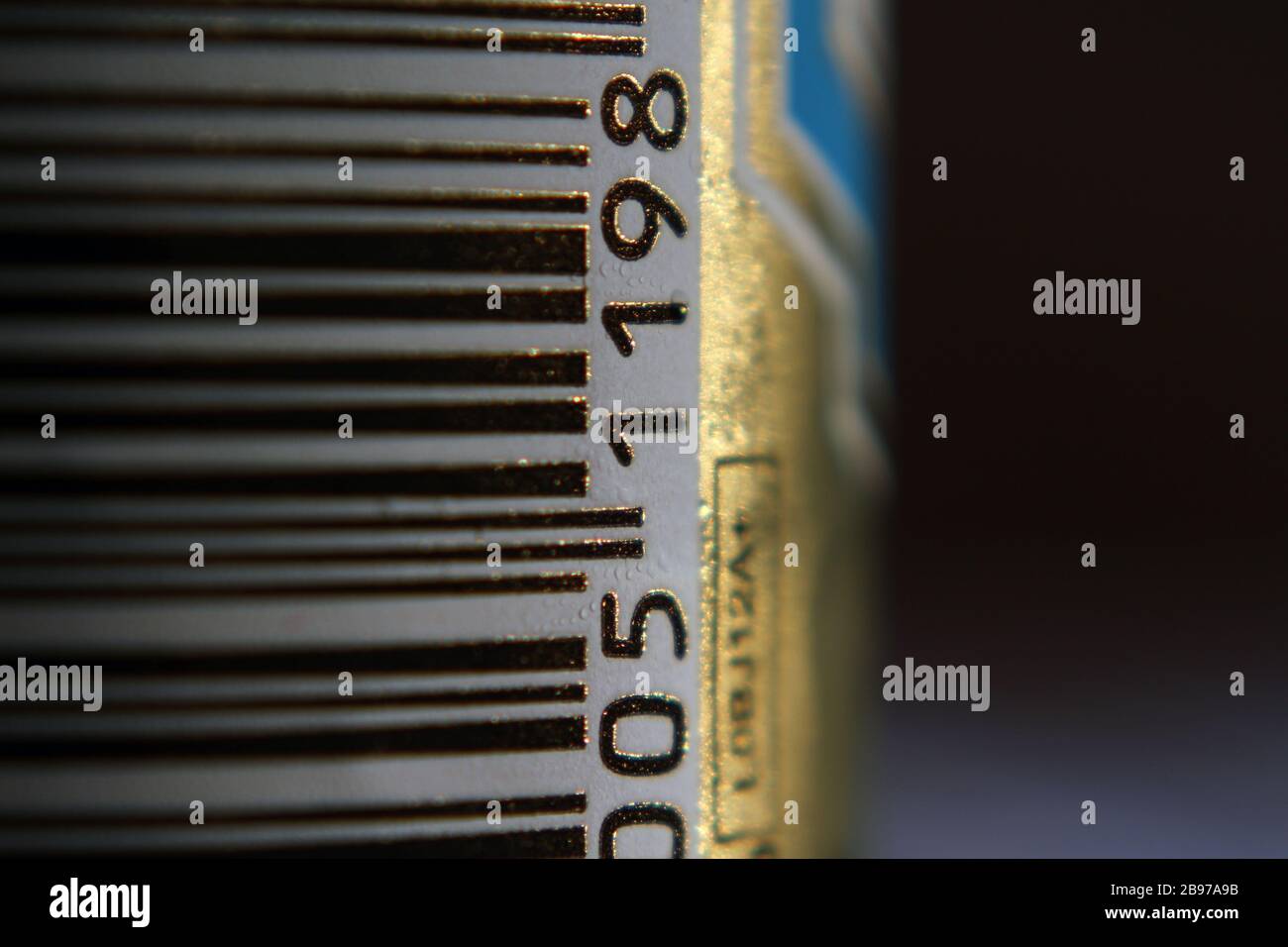 Closeup black and gold bar code with water droplets shallow DOF Stock ...