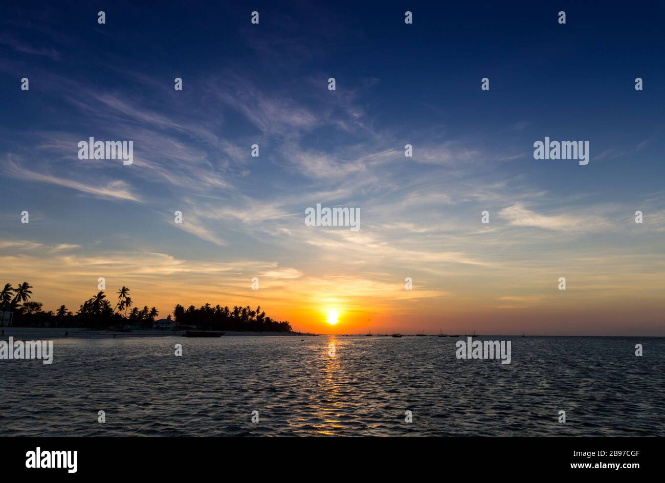 nice sunset sky with clouds over ocean Stock Photo - Alamy