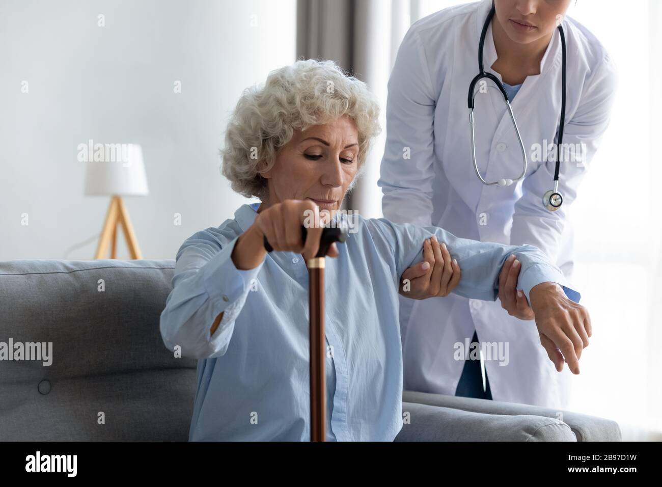 Help stand senior hi-res stock photography and images - Alamy