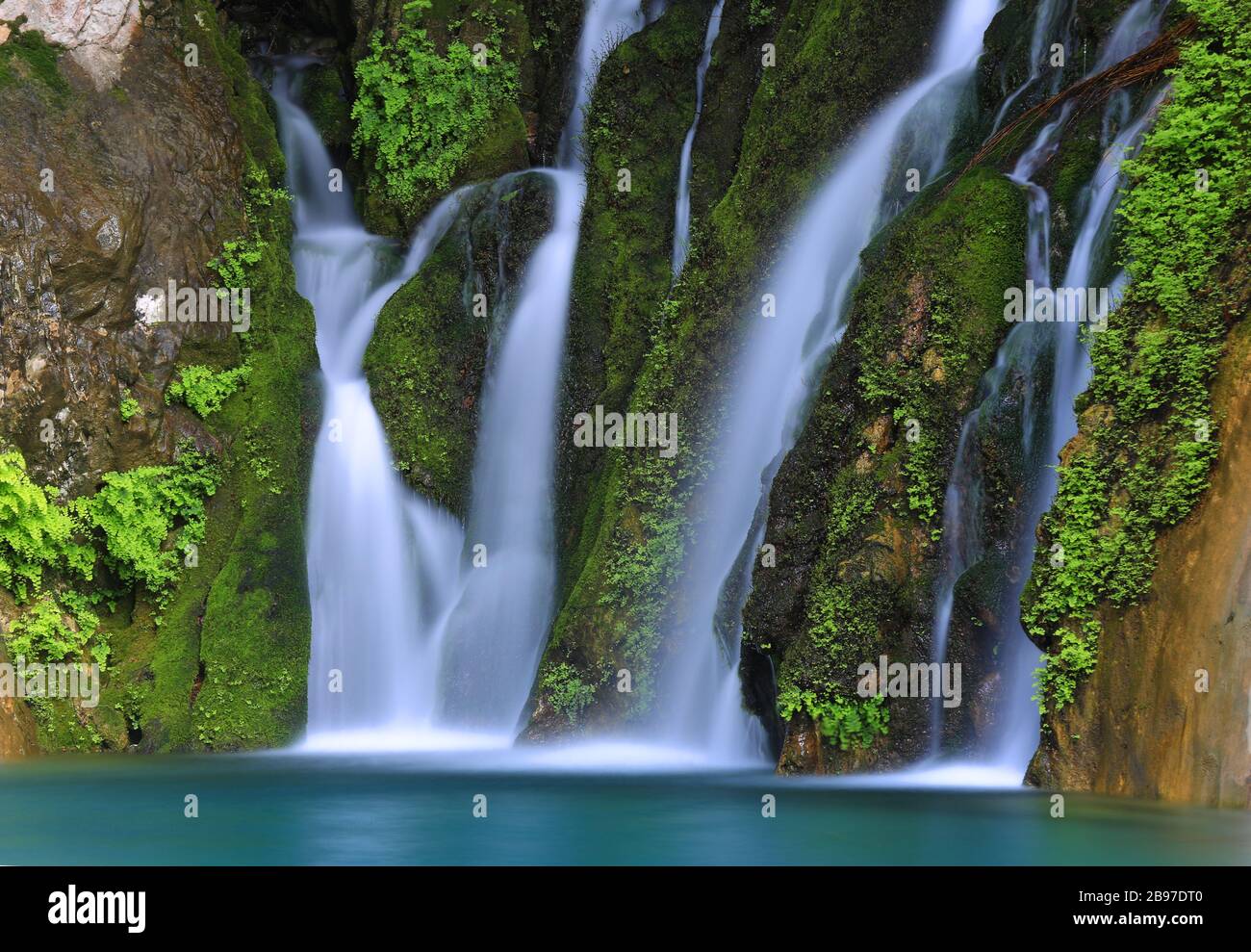 Nice small waterfall on mountain hi-res stock photography and images ...