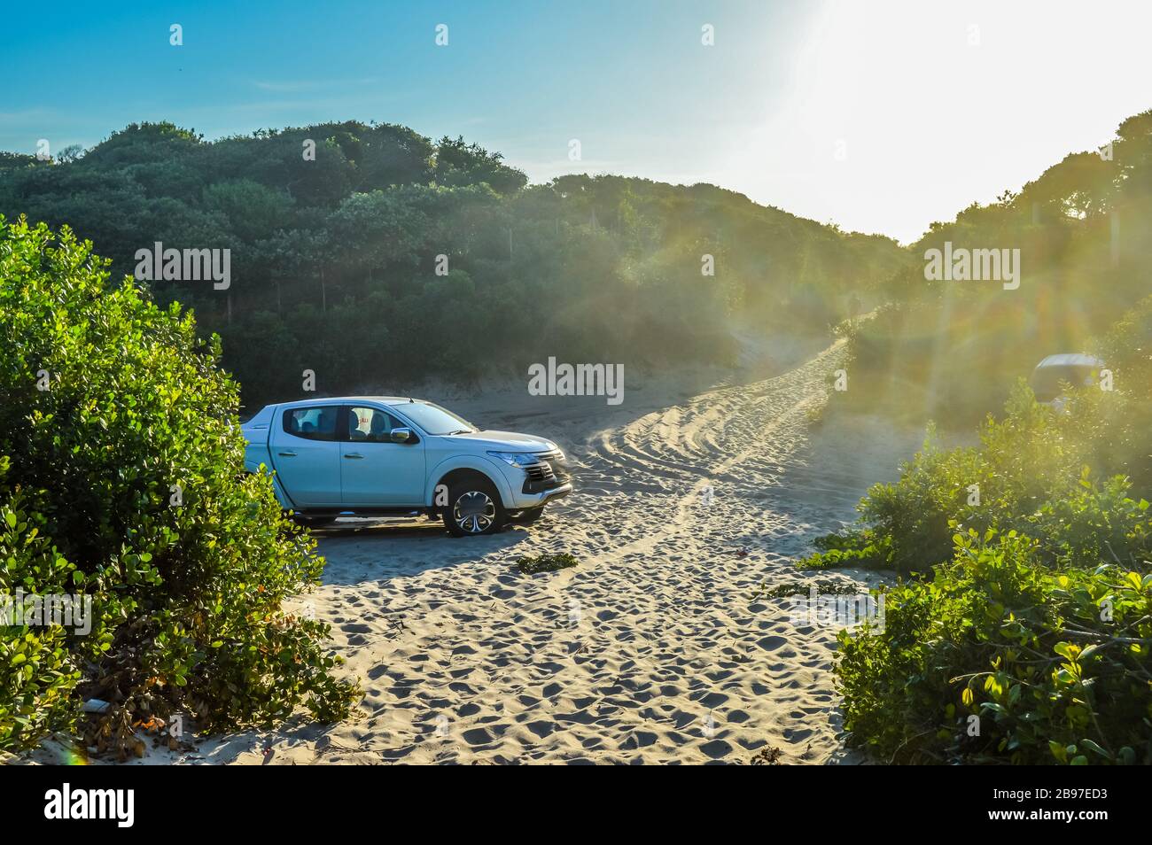 Car stuck in sand hi-res stock photography and images - Alamy