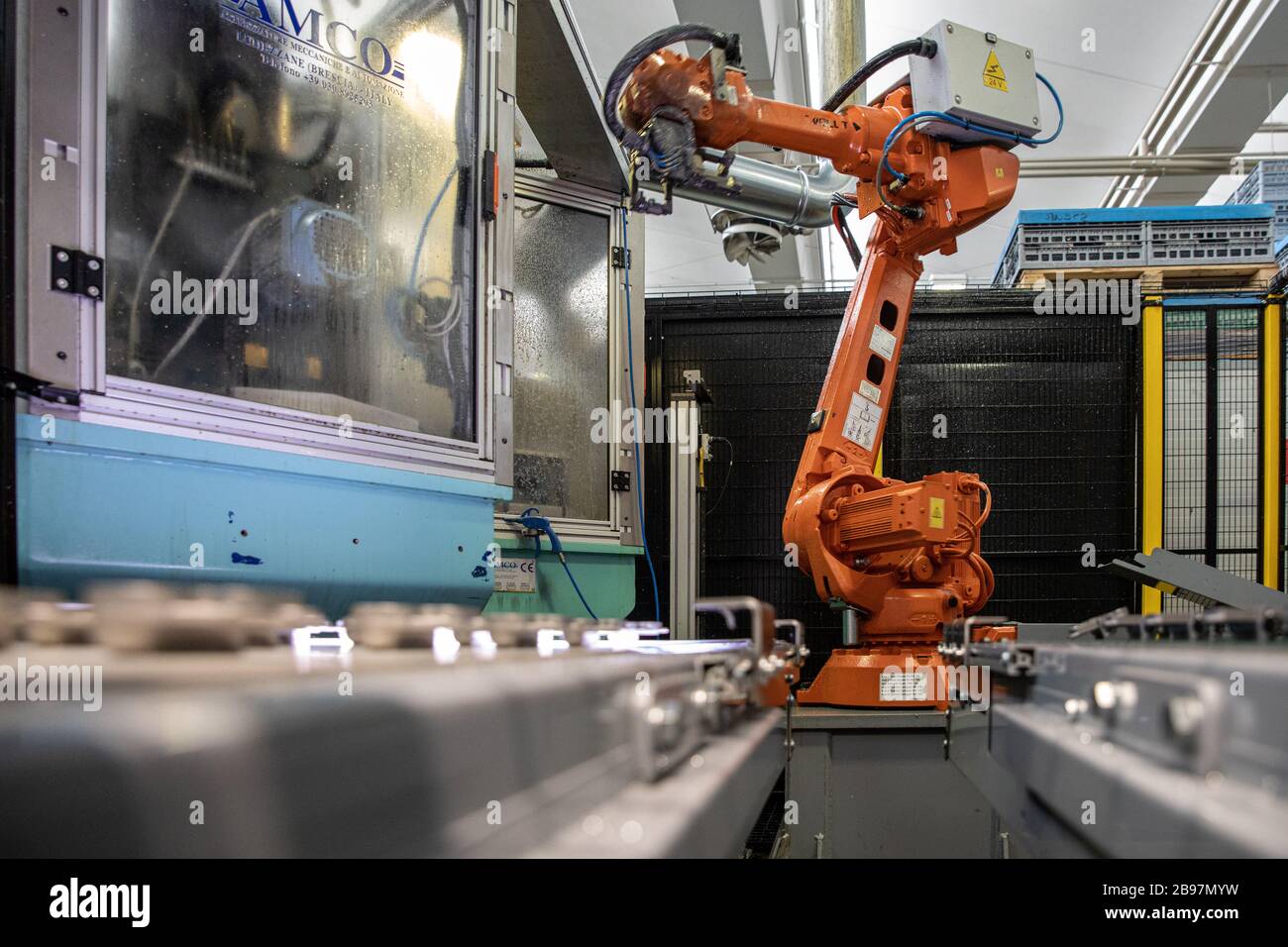 robot at work takes piece of aluminum Stock Photo - Alamy