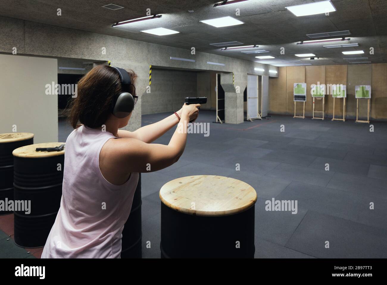 Girl shoots an arrow hi-res stock photography and images - Alamy