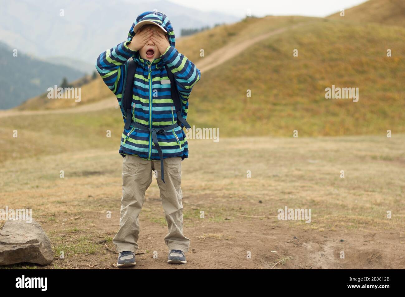Little boy traveler funny face Stock Photo - Alamy