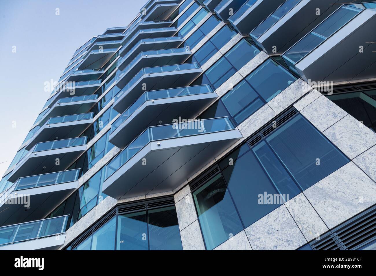 A view in perspective of the blue building Stock Photo - Alamy