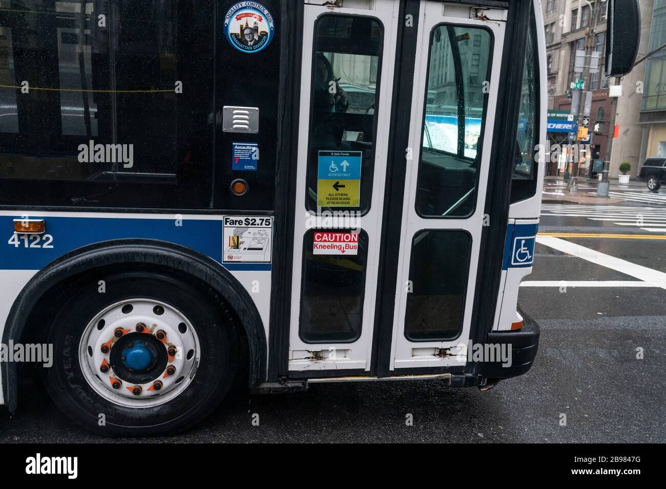 New York, NY - March 23, 2020: Retrofitted city bus to keep driver ...