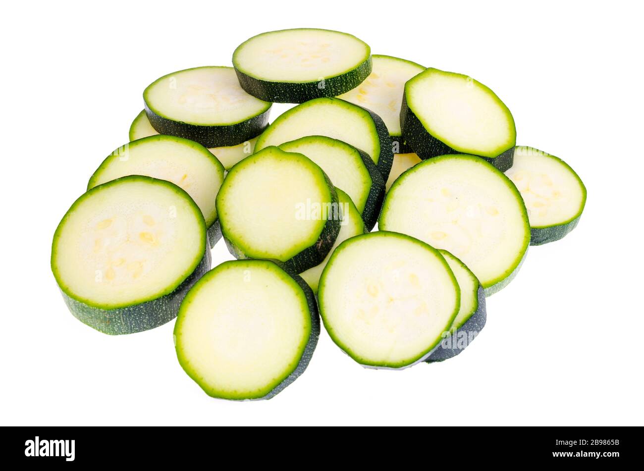 Zucchini chopped slices on white background as package design element ...