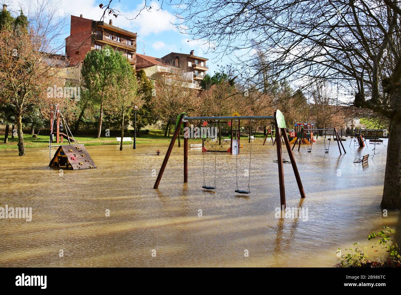 swings in the flooded park Stock Photo - Alamy