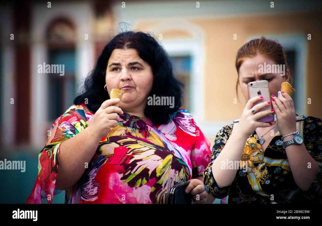 People on street in different activities, street life, urban scenery ...