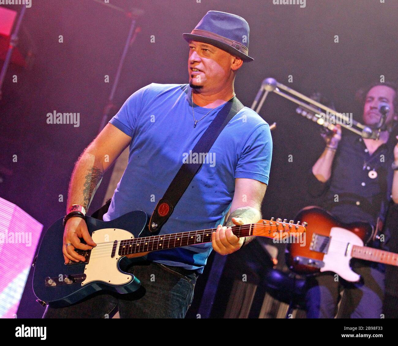 Train guitarist Jimmy Stafford performs with the rest of the band at ...