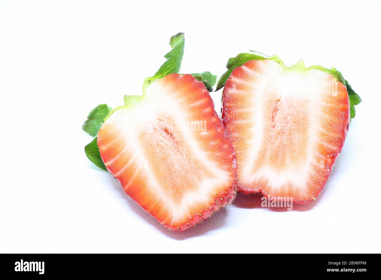 Cut strawberry hi-res stock photography and images - Alamy