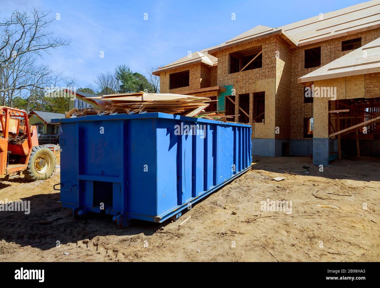 Construction trash dumpsters on metal container, house renovation Stock ...