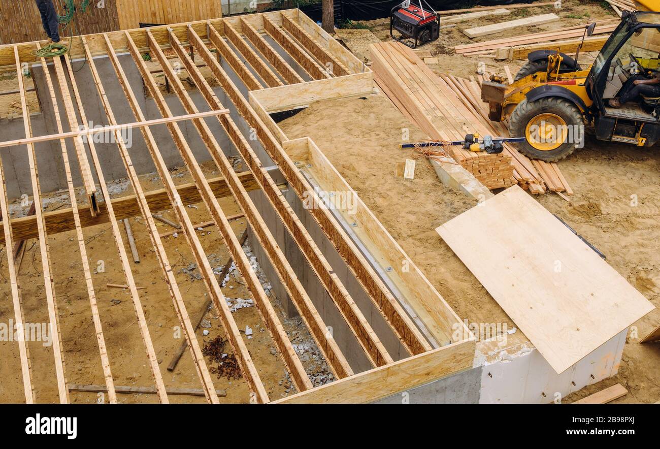 House framing floor construction showing massive solid wood joists ...