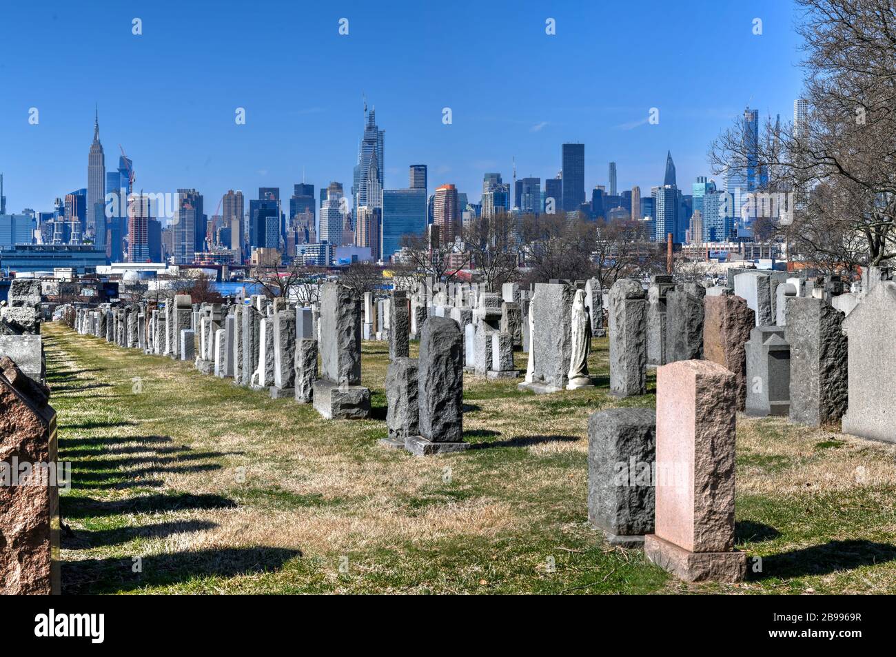 New York City - Feb 23, 2020: Calvary Cemetery with Manhattan skyline in New York. Calvary ...