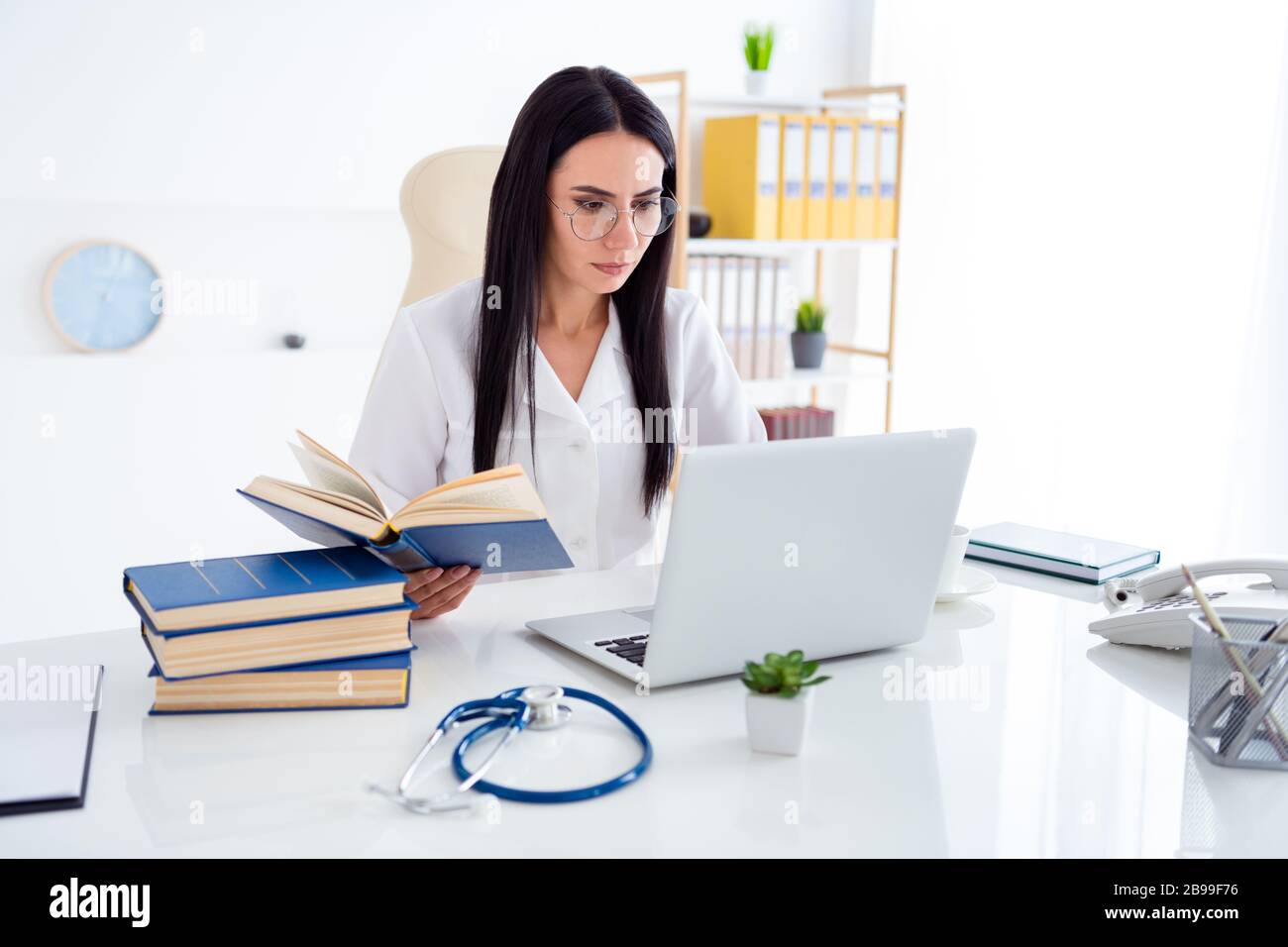 Photo of professional occupation doc lady hold science literature ...