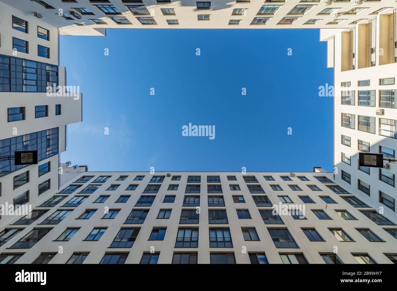 Modern bright buildings internal square yard view up to the sky Stock ...