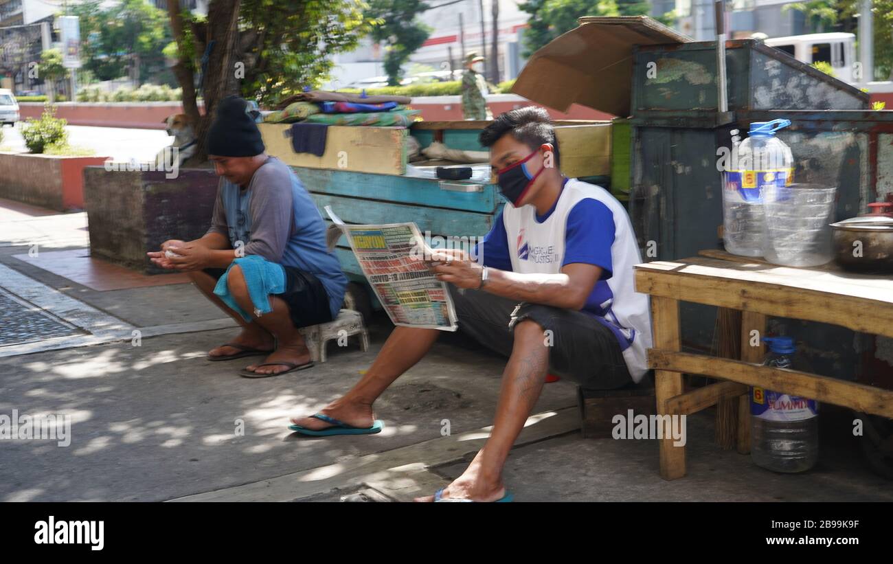 Manila, Philippines. 23rd Mar, 2020. Street beggars sleeping and ...