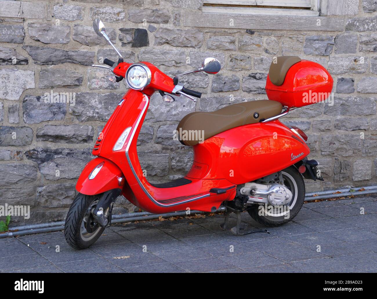 Bright red vespa scooter hi-res stock photography and images - Alamy