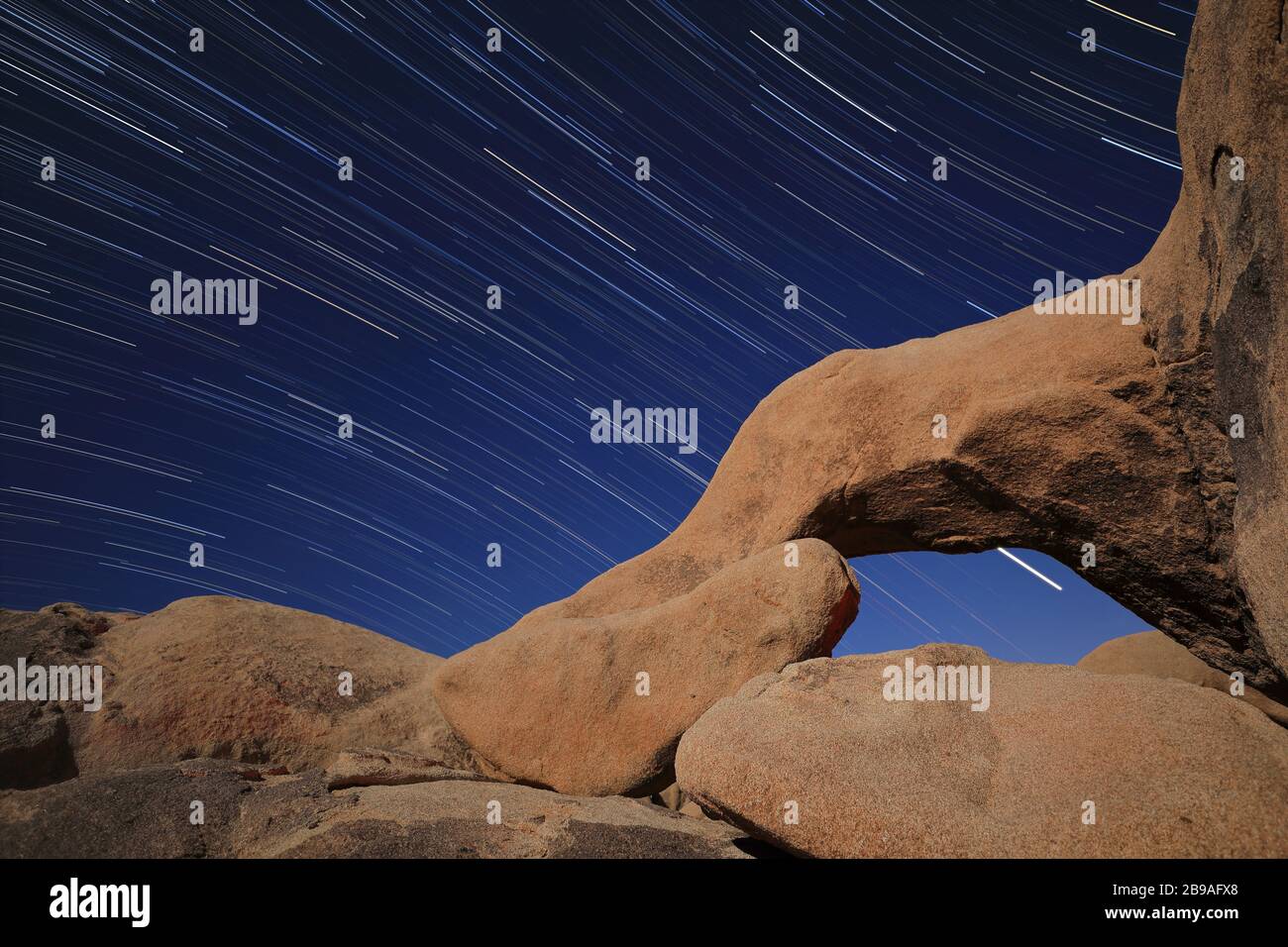 Star Trail over Arch Rock Joshua Tree National Park Stock Photo - Alamy