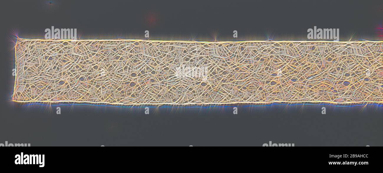 Strip of bobbin lace with a drop-shaped motif in a tangled pattern of ...