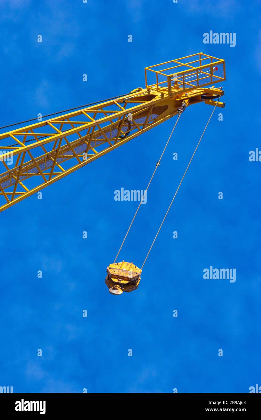 Yellow construction crane Stock Photo - Alamy