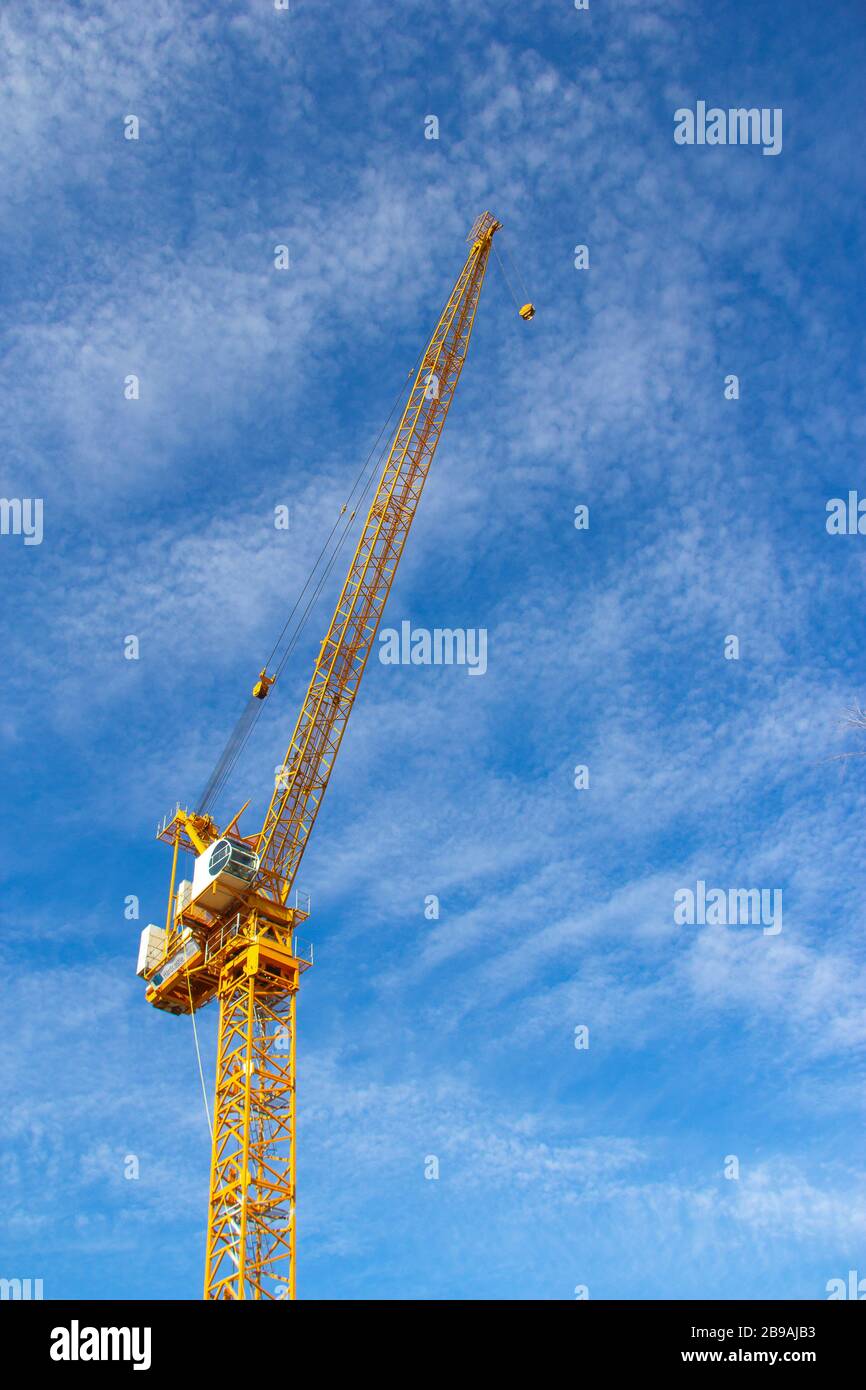 Yellow construction crane Stock Photo - Alamy