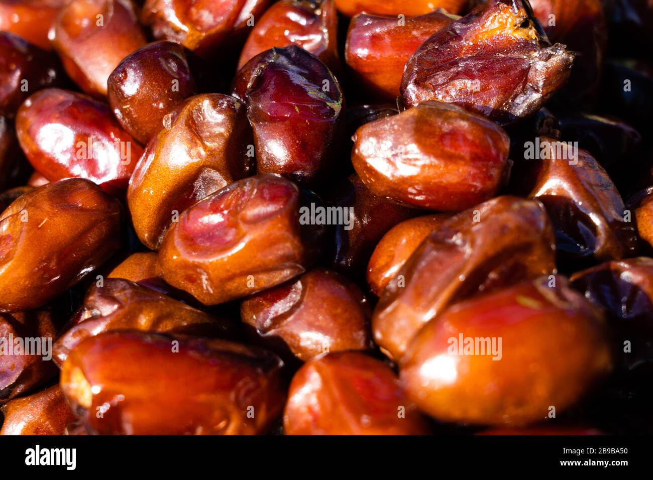Dried dates ,macro shot , focus on a center Stock Photo - Alamy