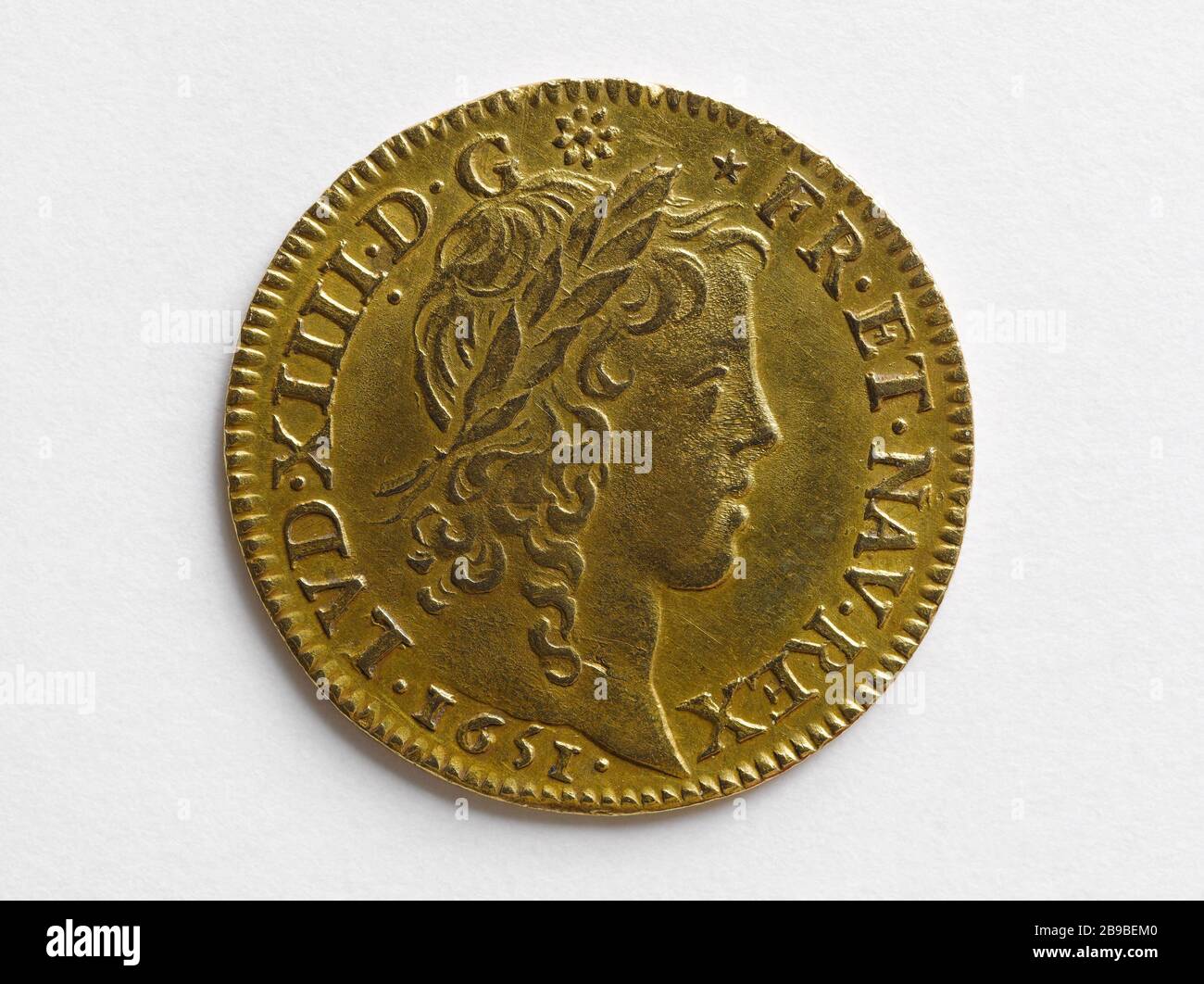 Louis gold in the long wick of Louis XIV, 1651 Anonyme. Louis d'or à la ...