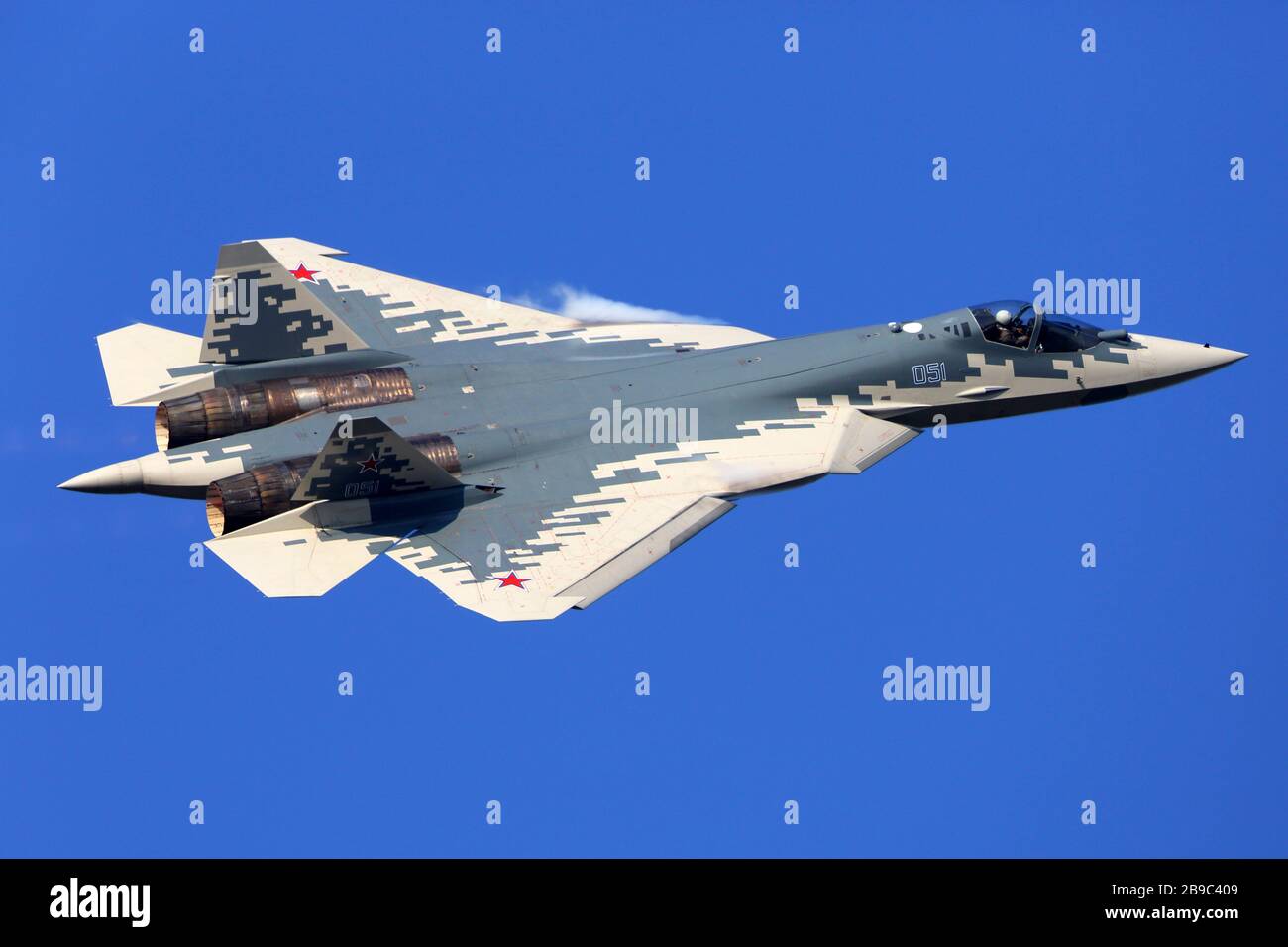 Su-57 jet fighter of the Russian Air Force against a blue sky Stock ...