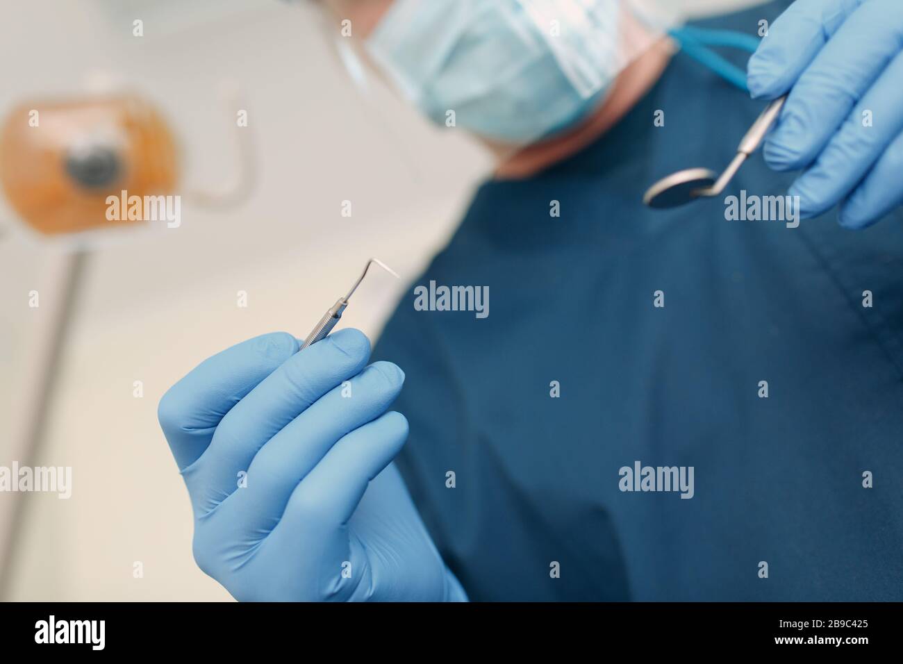 Dentistry. Dentist with instruments. Dental clinic. Patient First ...