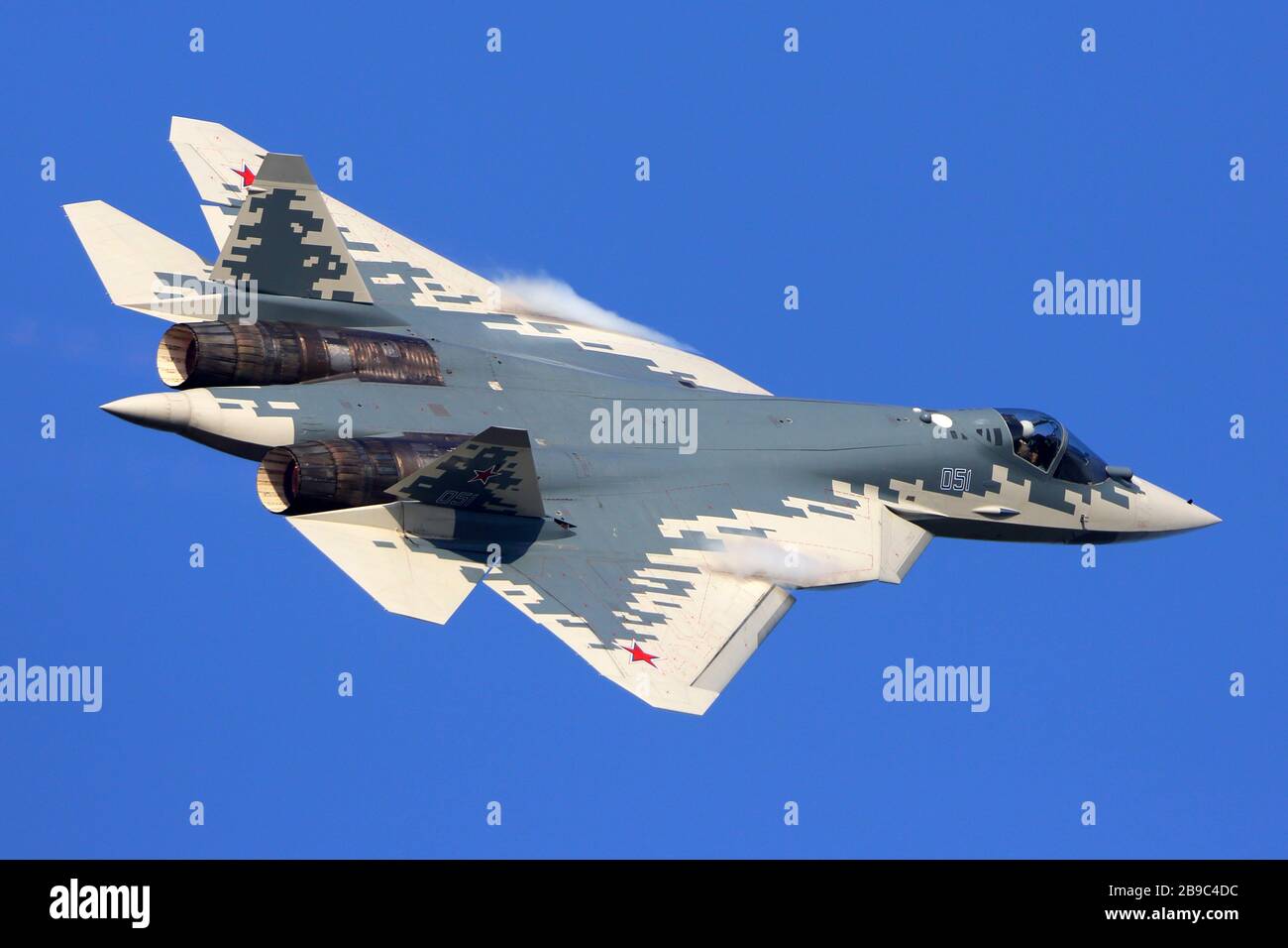 Su-57 jet fighter of the Russian Air Force against a blue sky Stock ...