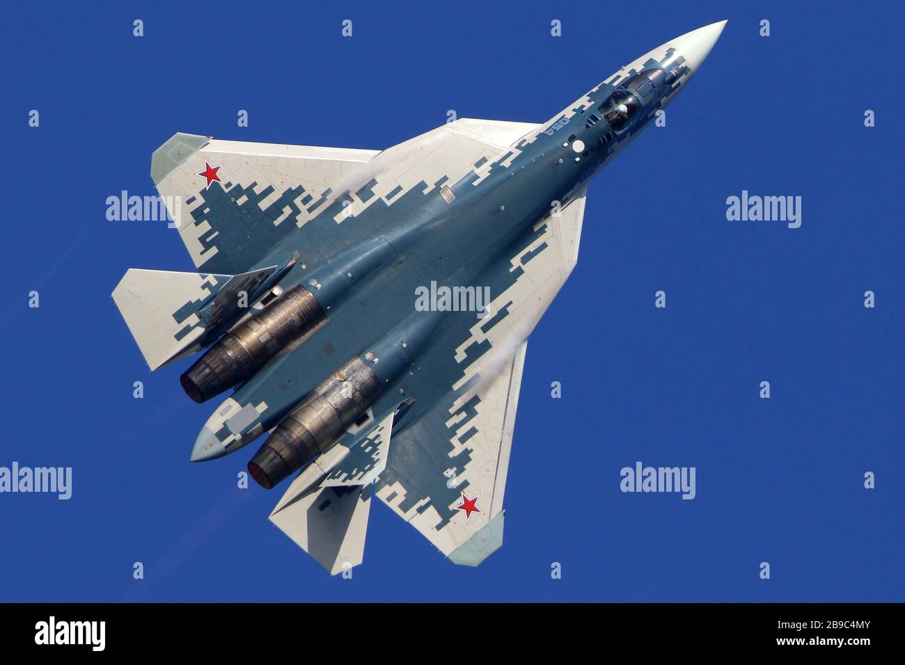 Su-57 jet fighter of the Russian Air Force against a blue sky Stock ...