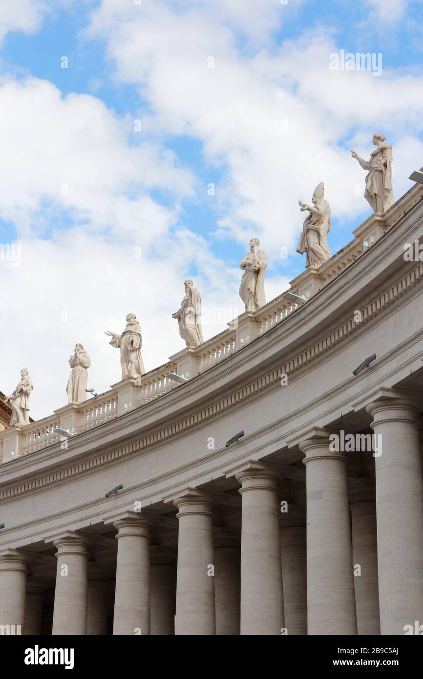 A group of Saint Statues on the colonnades of St Peter's Square with ...