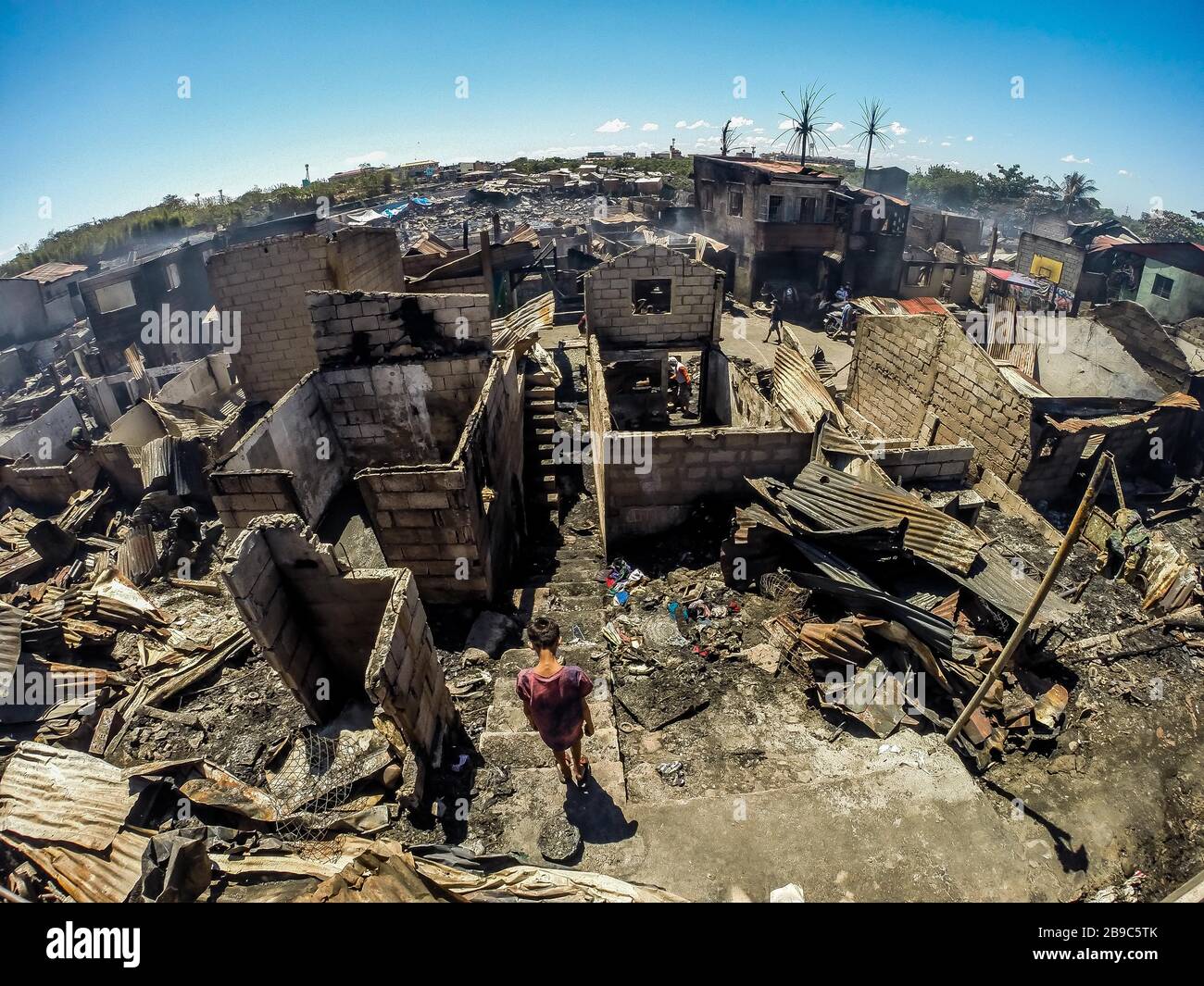 Beijing, Philippines. 23rd Mar, 2020. Residents look for their ...