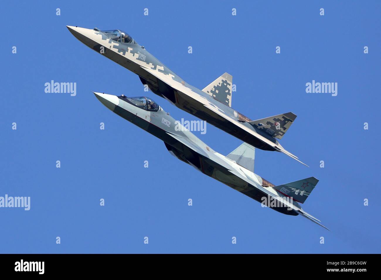 Su-57 jet fighters of the Russian Air Force against a blue sky Stock ...
