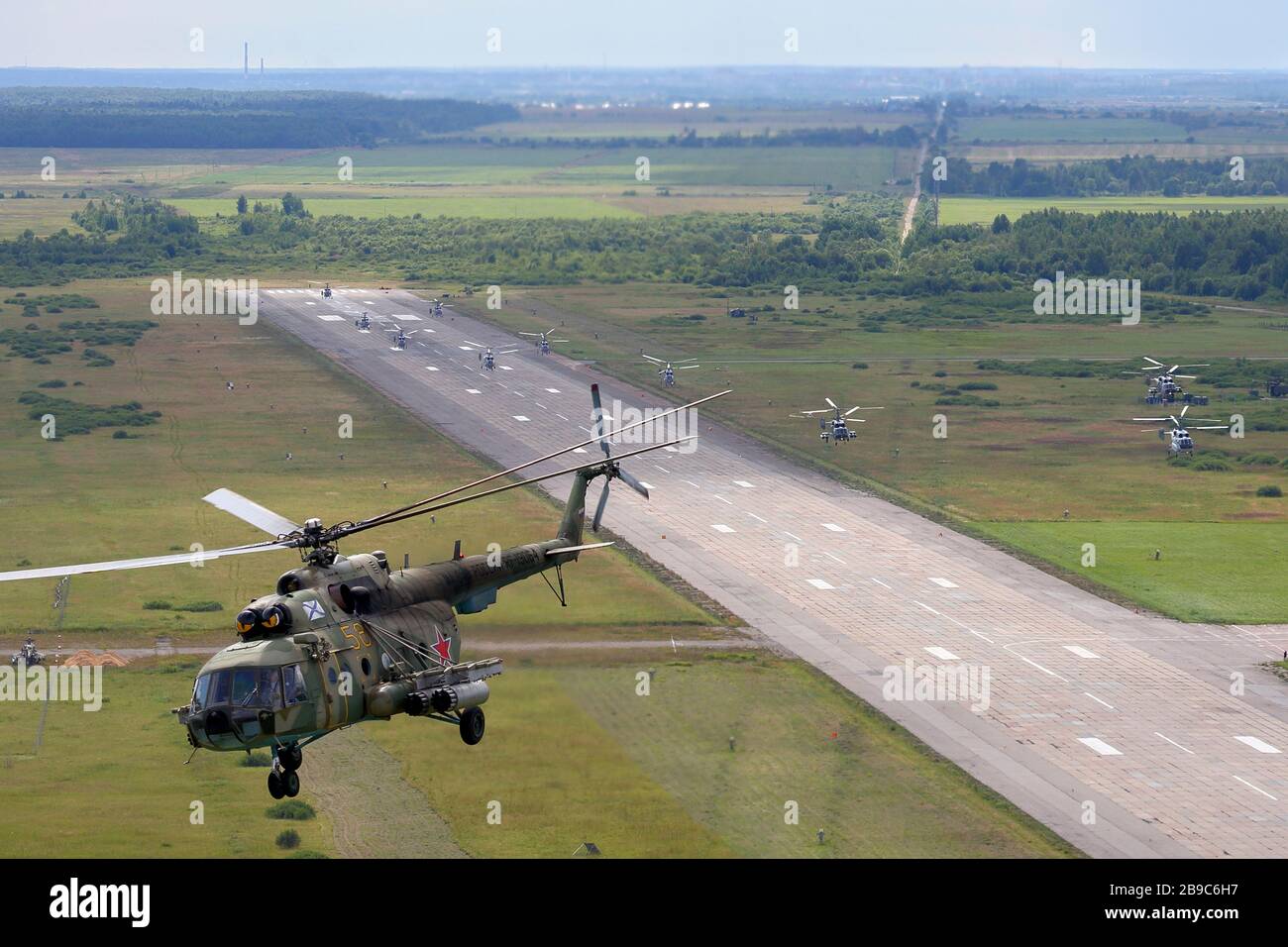 Mil Mi-8MT military transport helicopters of the Russian Navy taking ...
