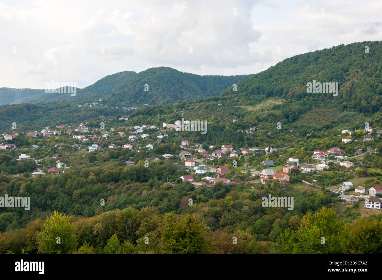 Mountain landscape - summer, mountains, sky and small houses in the ...