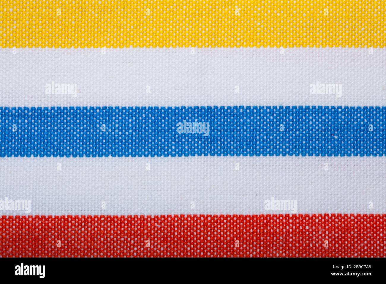Closeup of colorful horizontal striped fabric textile as background ...