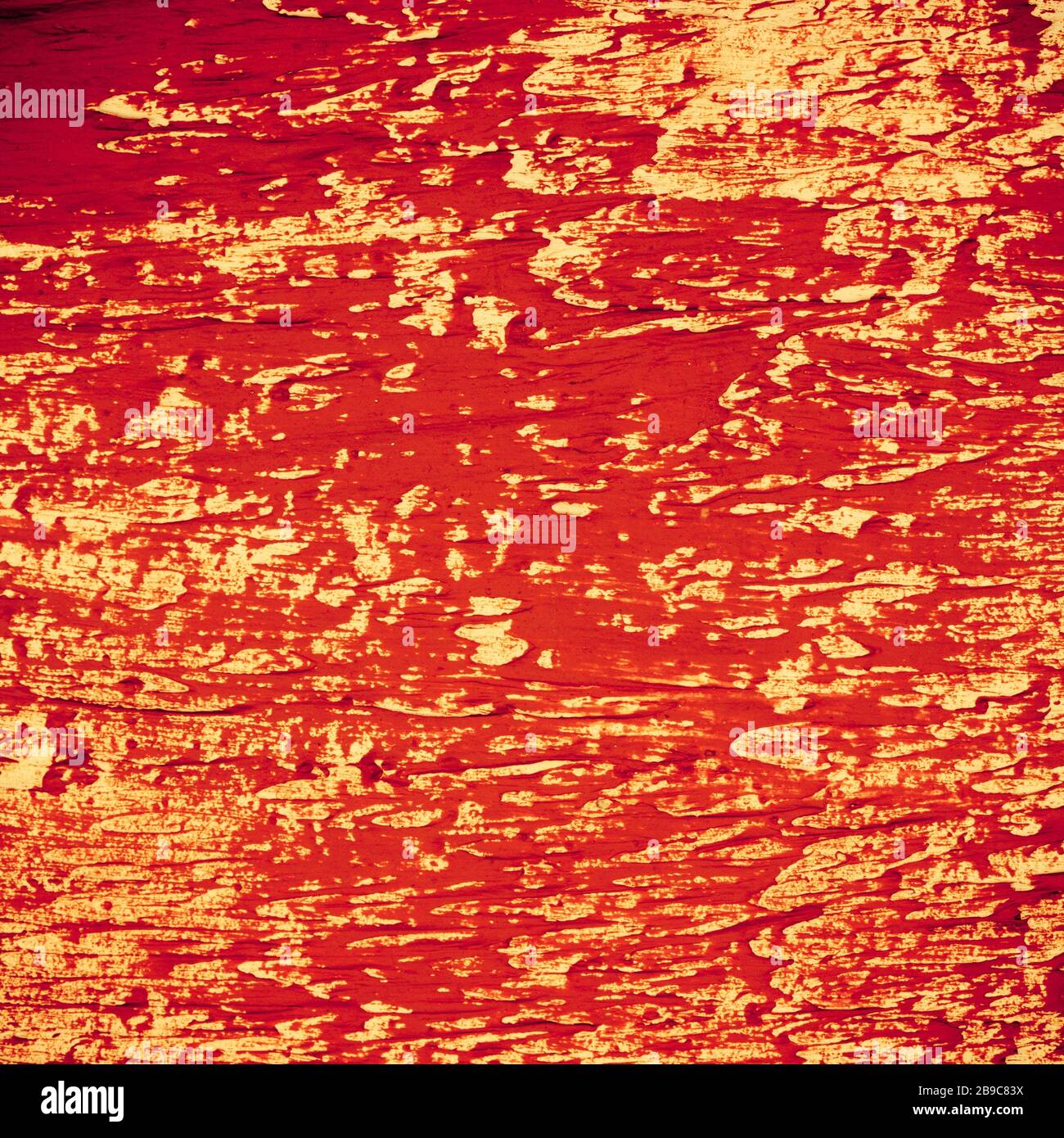 Architecture. Closeup of red peeling paint on wall as grunge background ...