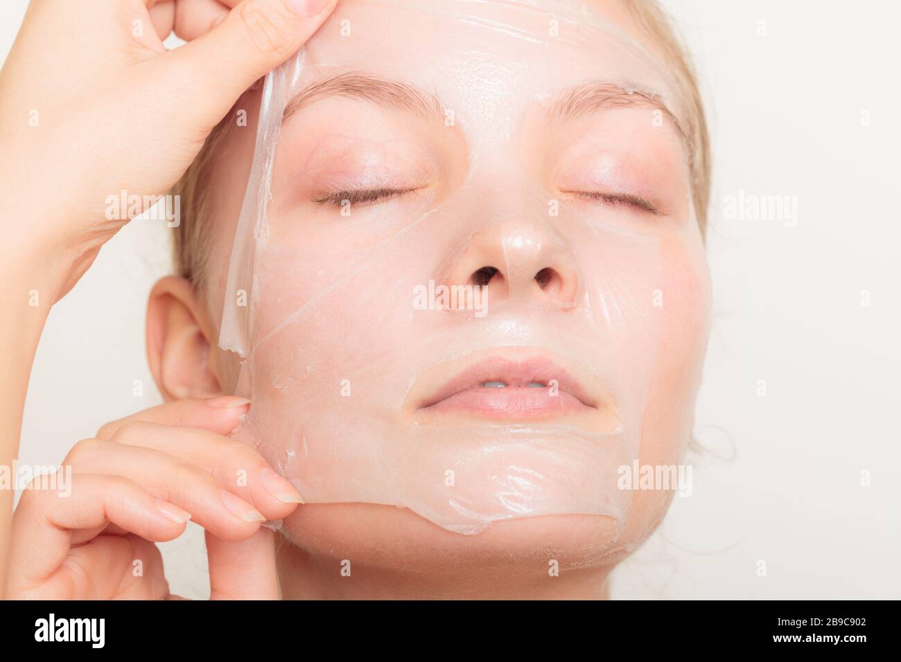 Beauty skin care cosmetics and health concept. Closeup young woman face ...