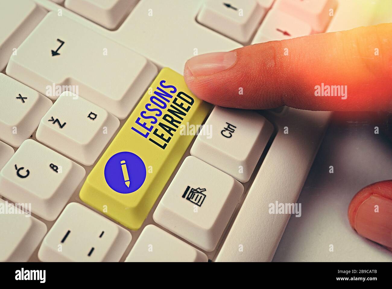 Writing note showing Lessons Learned. Business concept for the knowledge or understanding gained ...