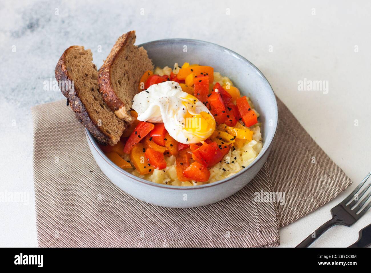 Potato risotto with grilled red pepper, poached egg and warm bread ...