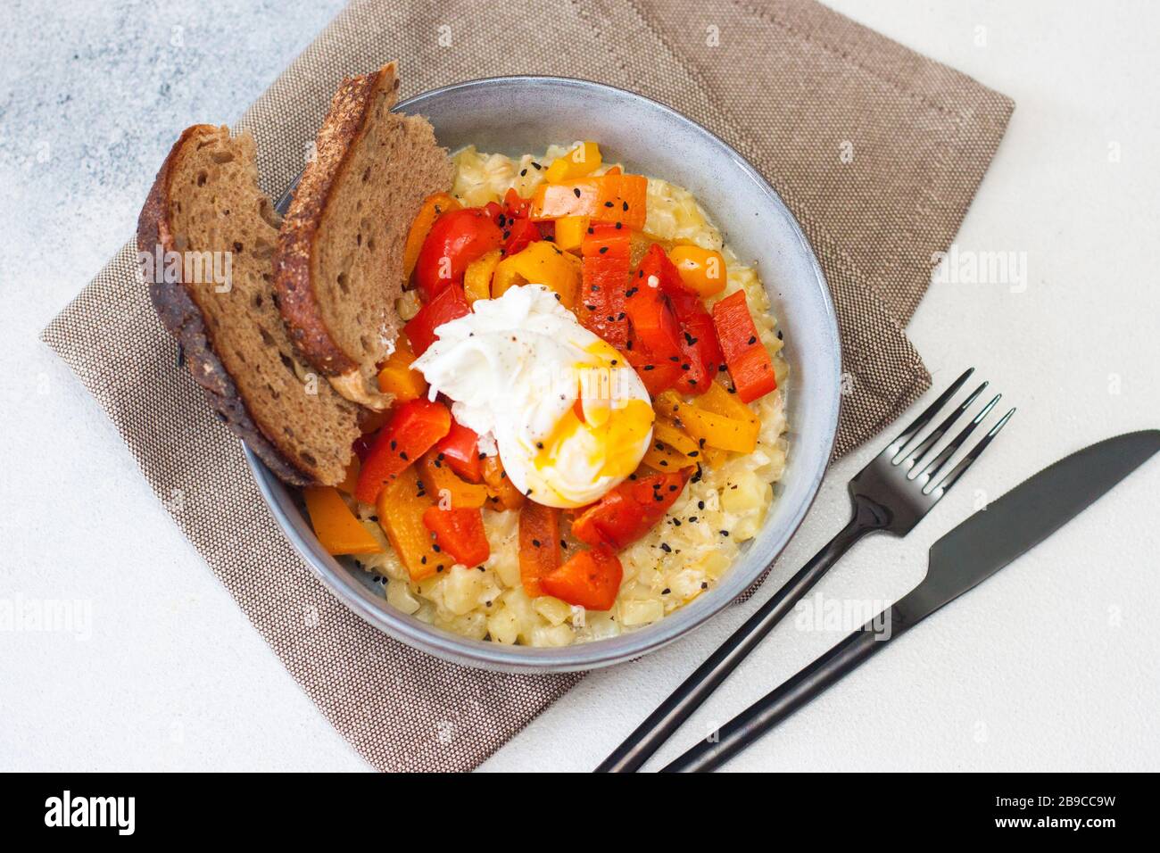 Potato risotto with grilled red pepper, poached egg and warm bread ...
