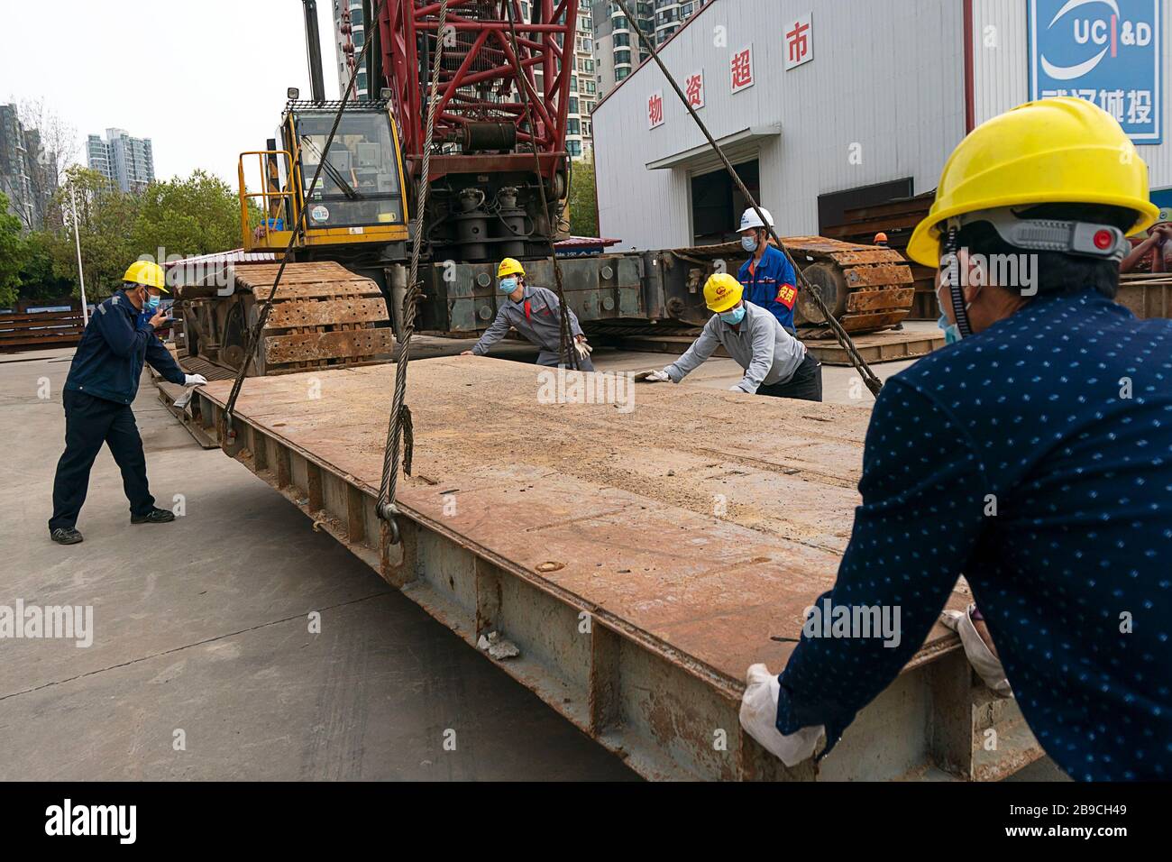 Wuhan, China's Hubei Province. 24th Mar, 2020. Workers work at the ...