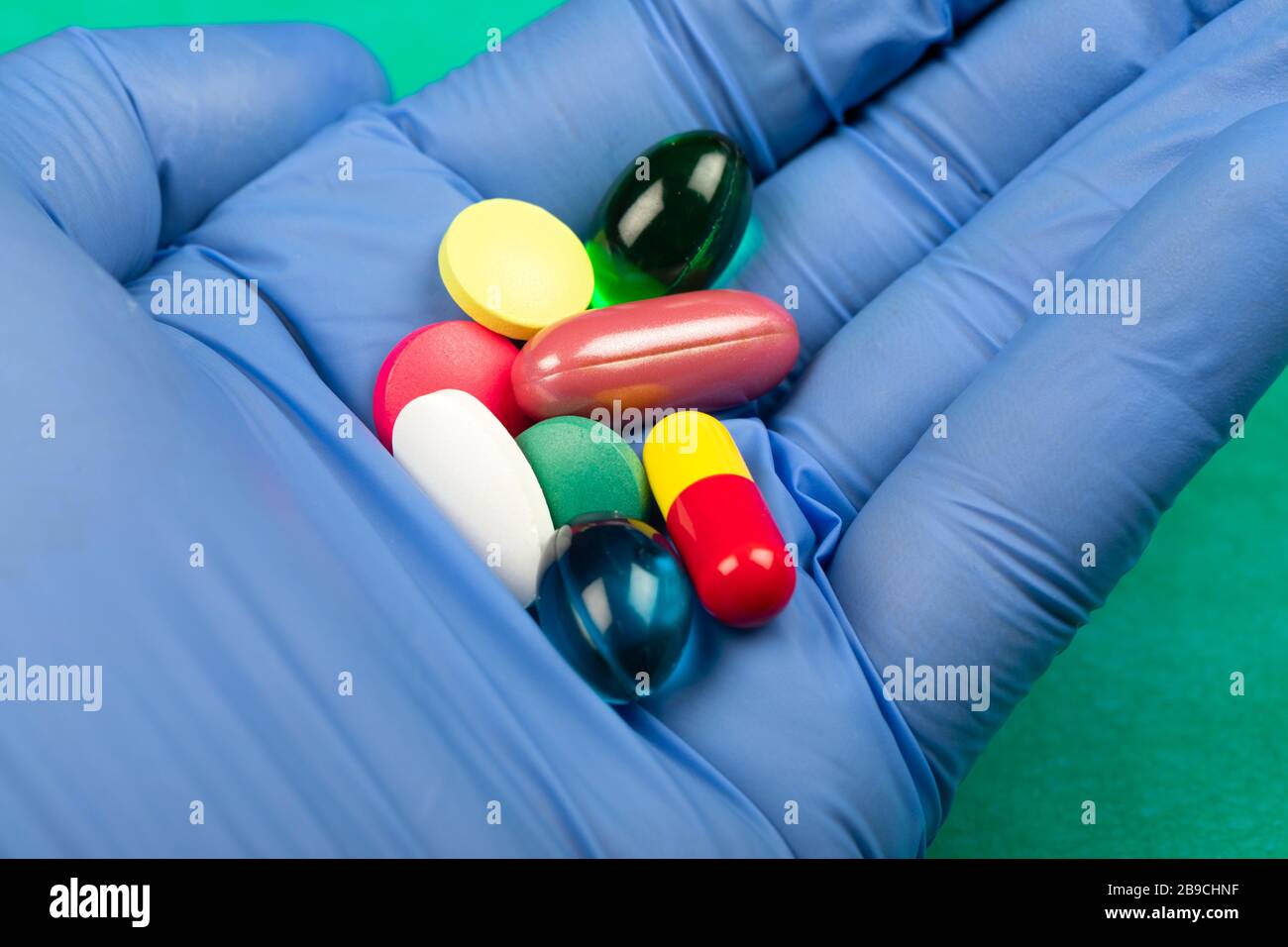 Close up picture of multi-colored medical drugs and vitamins in doctor ...