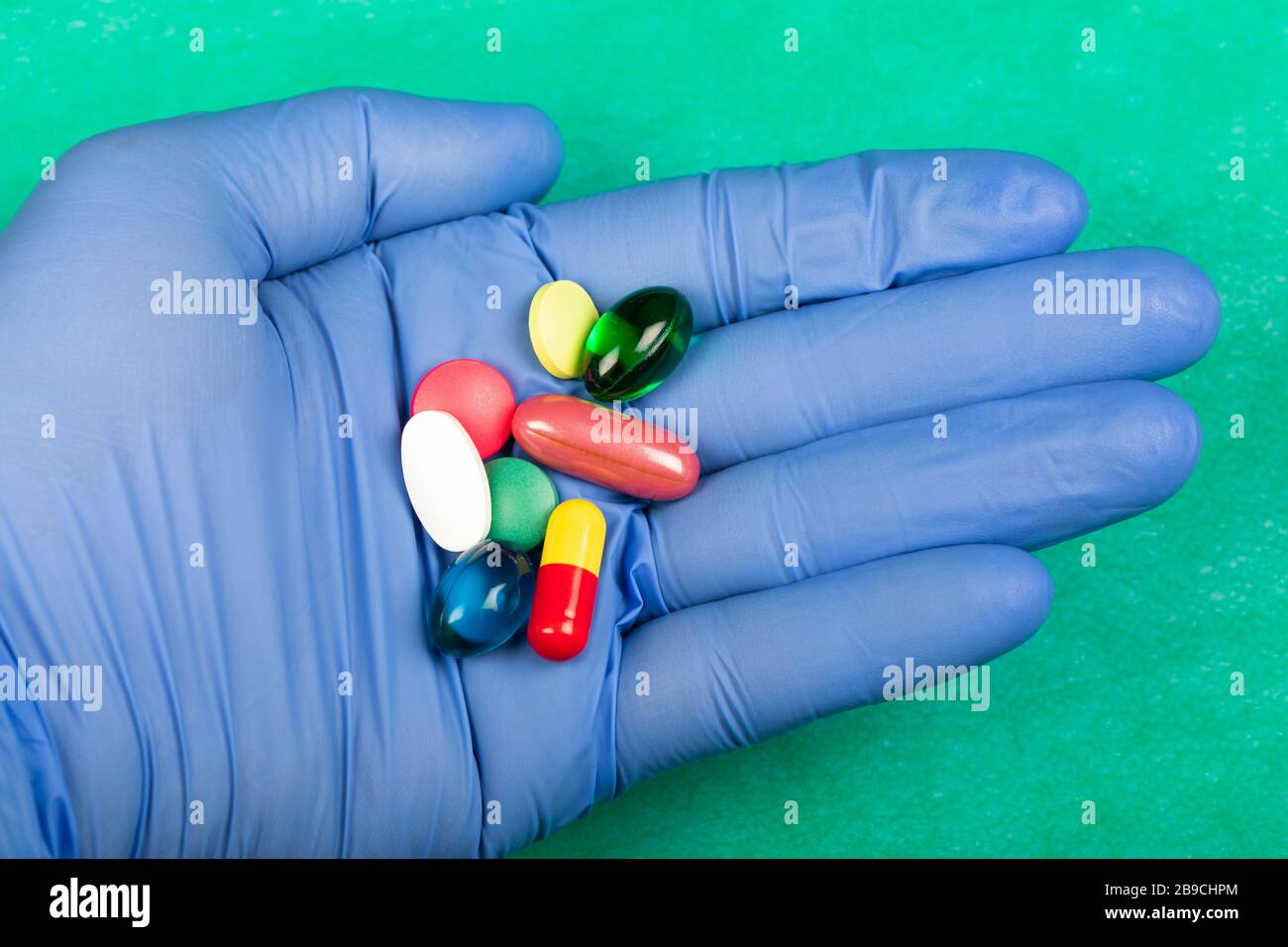 Close up picture of multi-colored medical drugs and vitamins in doctor ...