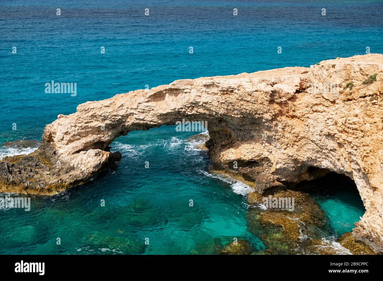 Love Bridge - a rocky arch bridge of natural origin over the crystal ...