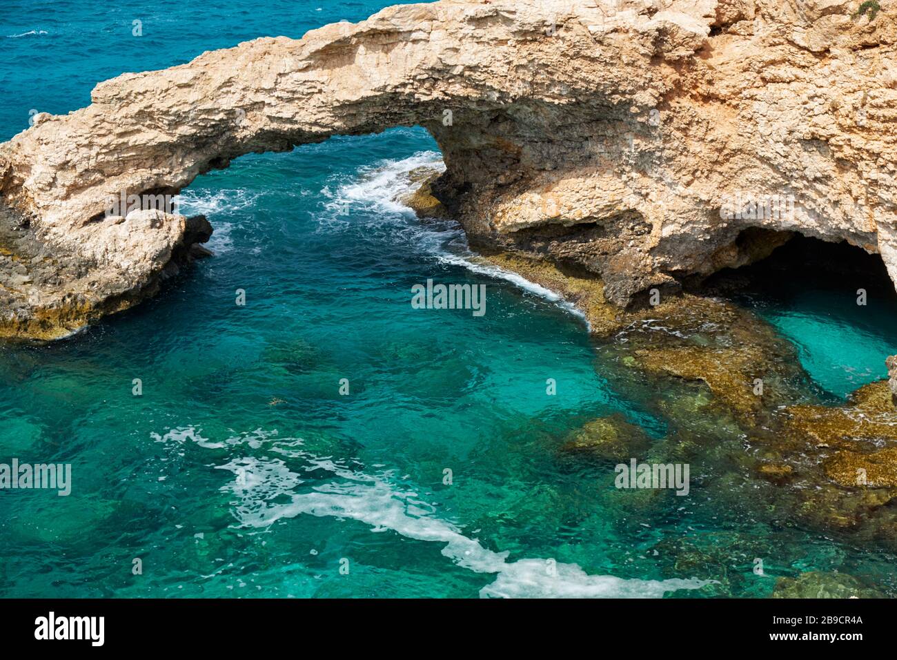 Love Bridge - a rocky arch bridge of natural origin over the crystal ...