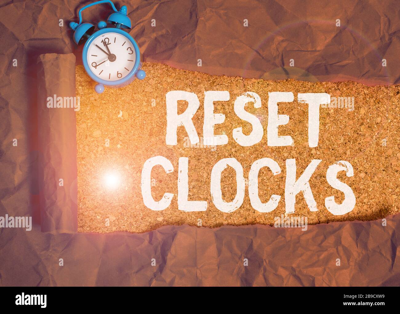 Writing note showing Reset Clocks. Business concept for To revisit ...